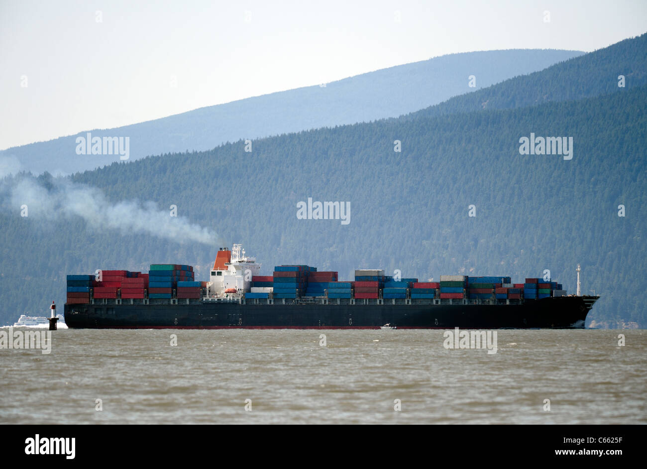 Ship with containers on the sea Stock Photo - Alamy