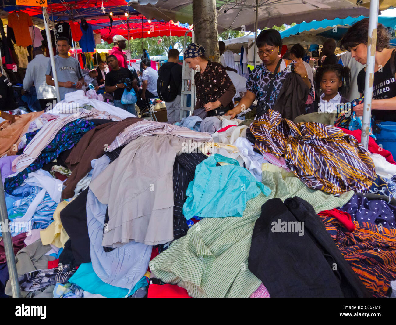 Montreuil, France, Diverse Women Shopping for Used Clothing in Local ...