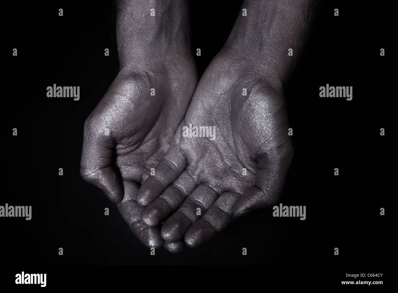 Two open hands holding handful hi-res stock photography and images - Alamy