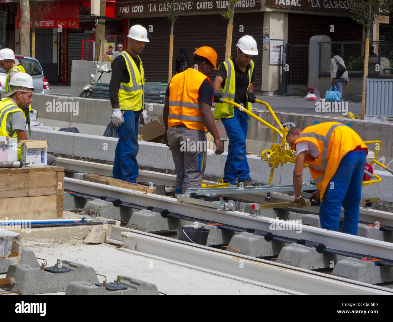 Group men working tram paris hi-res stock photography and images - Alamy