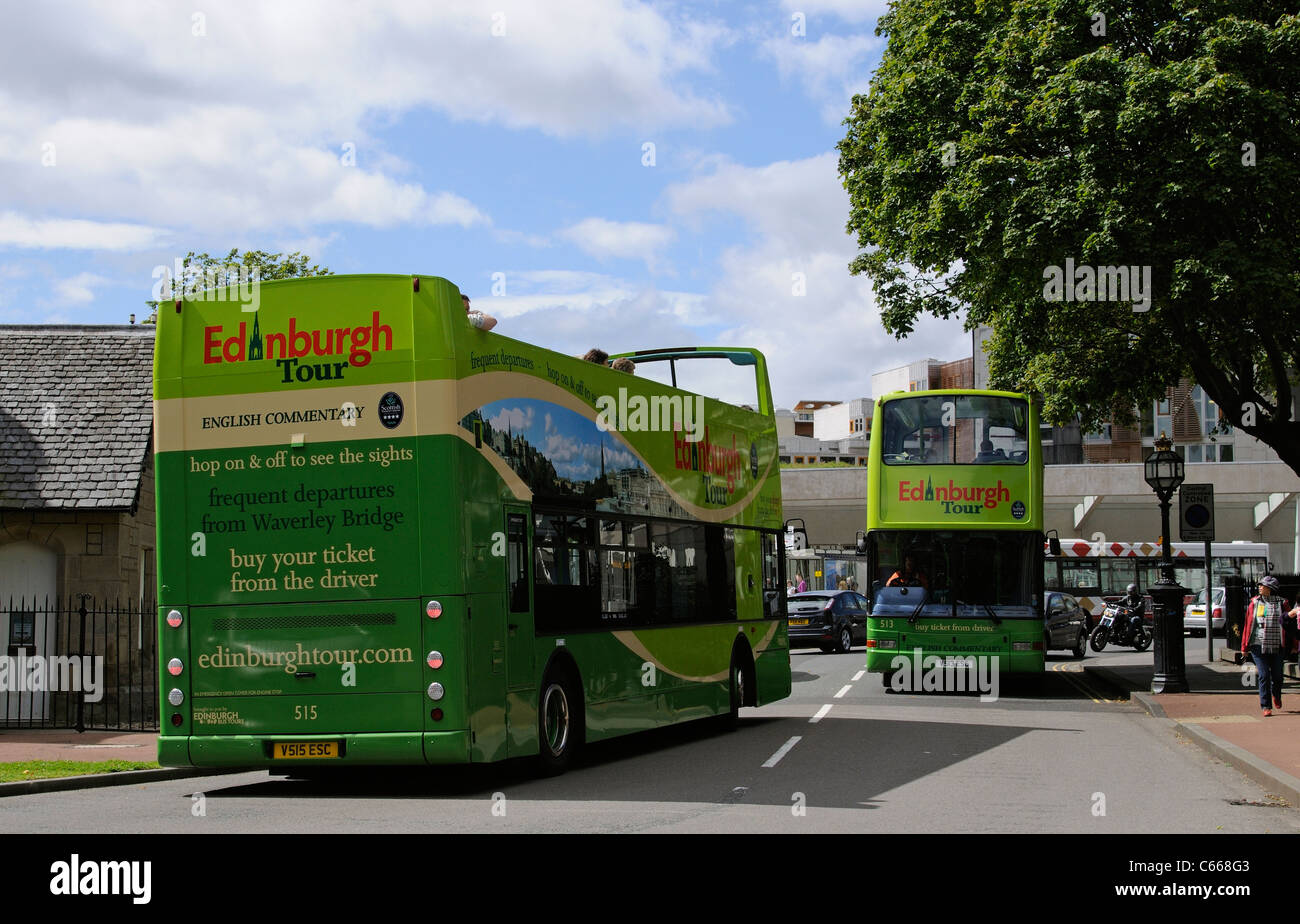 Edinburgh Scotland UK green tour buses touring the city Stock Photo - Alamy