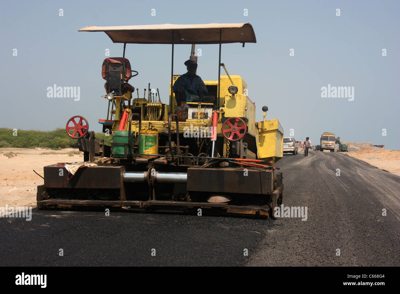 Road roller tarmac machine used in construction of mountain highway in ...