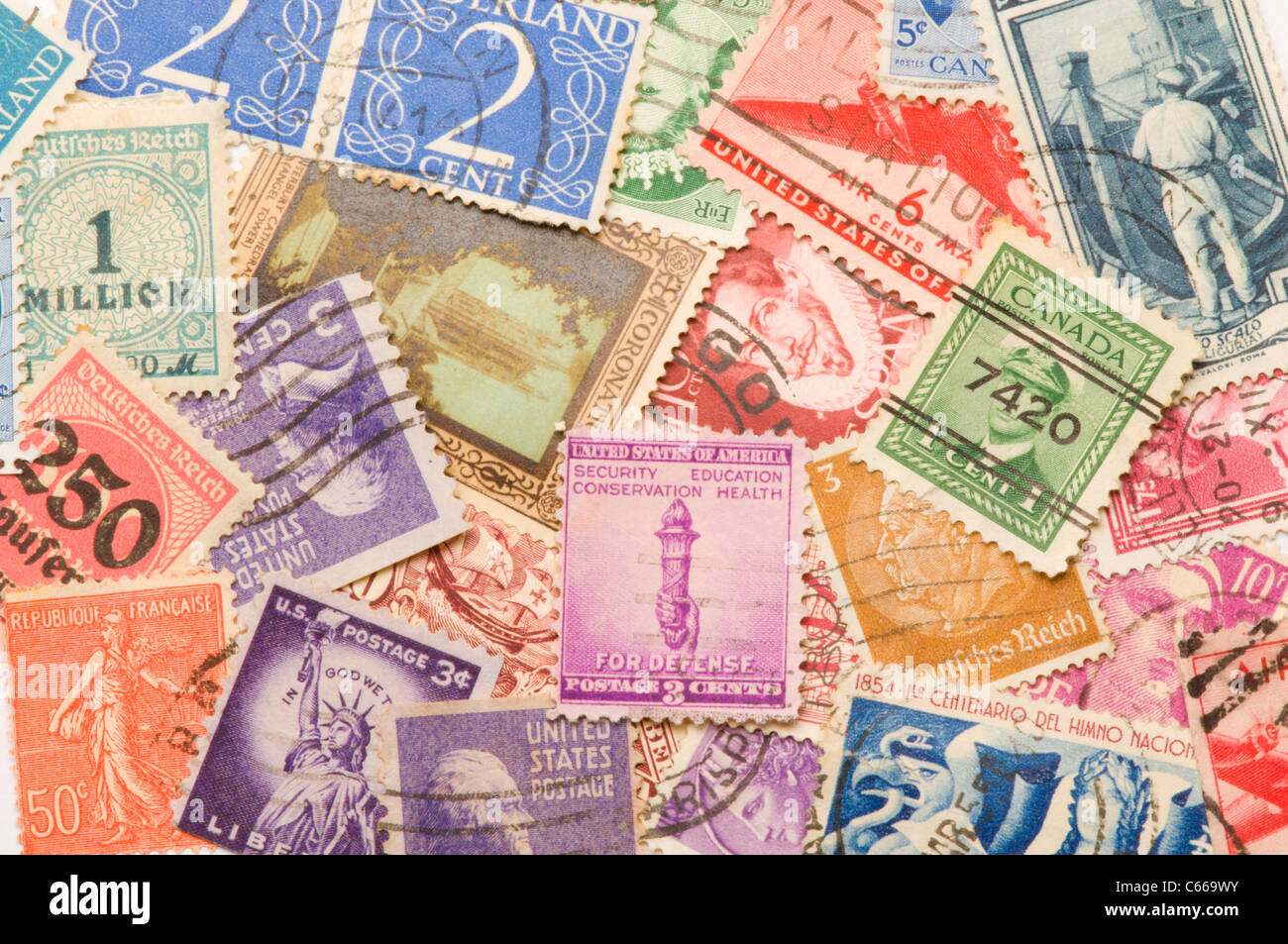 Pile of postage stamps Stock Photo - Alamy