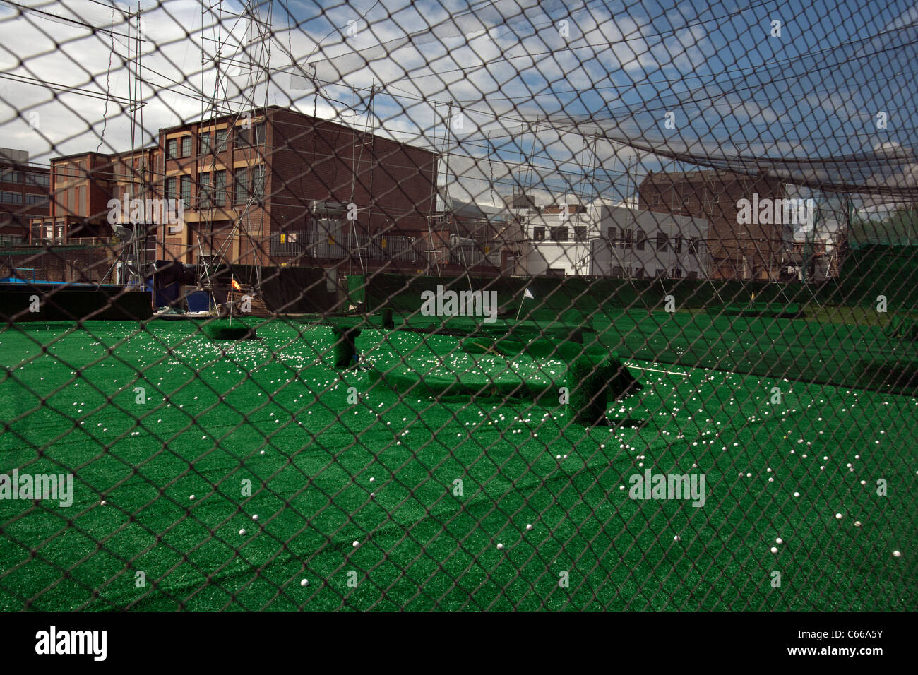 golf driving range in the city of london Stock Photo - Alamy