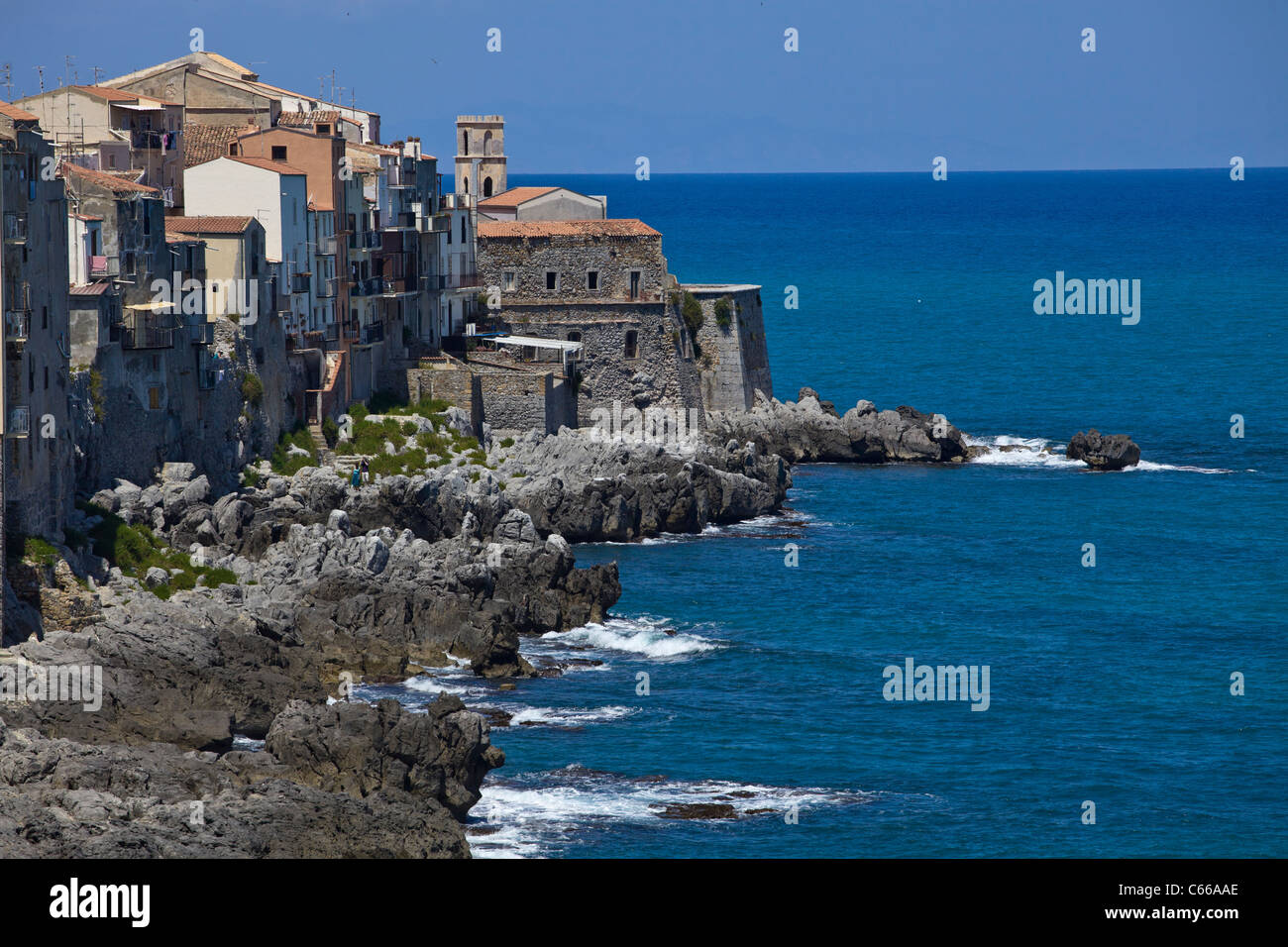 Medieval houses and seafront of old village, Cefalu, Palermo Province ...