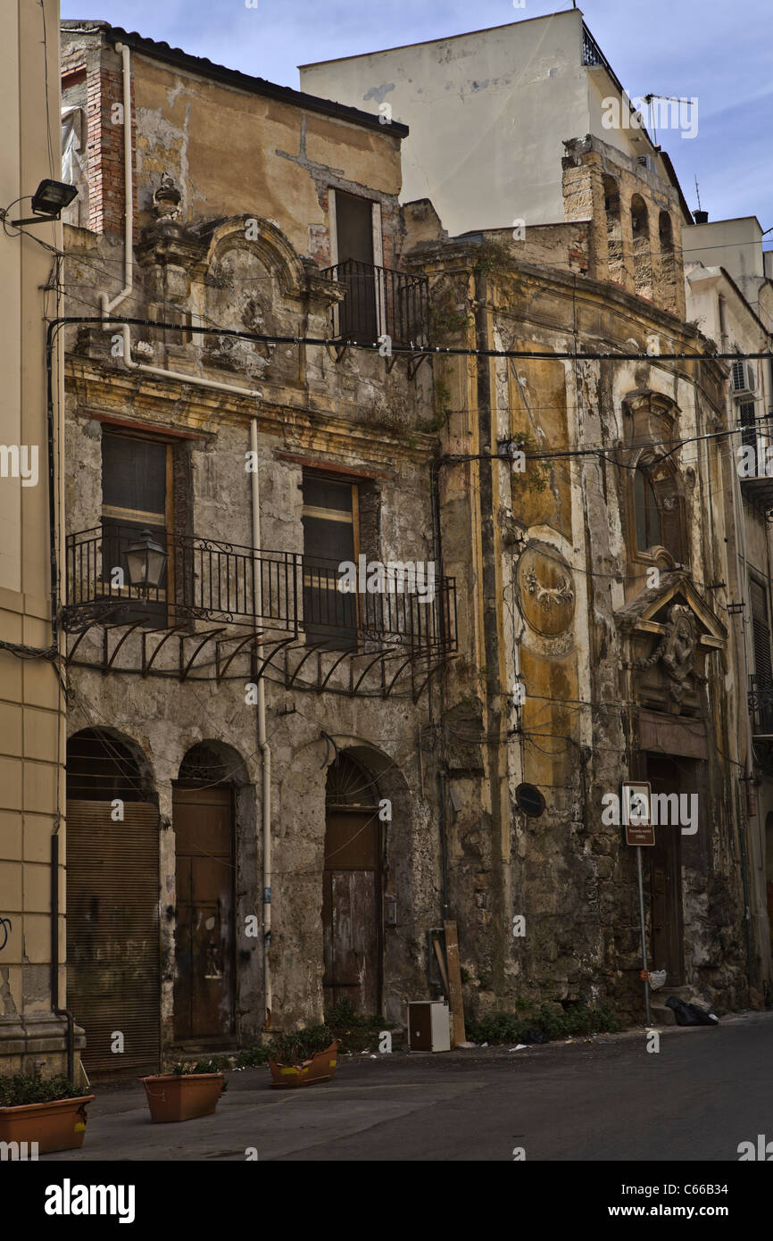 Old and dirty front of buildings in a poor district of Palermo (La ...