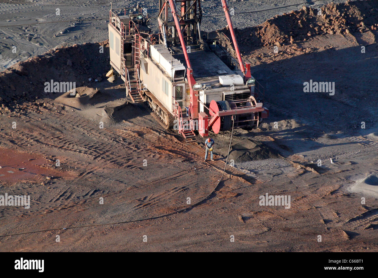 Hull–Rust–Mahoning Open Pit Iron Mine, workman making checks beside a ...