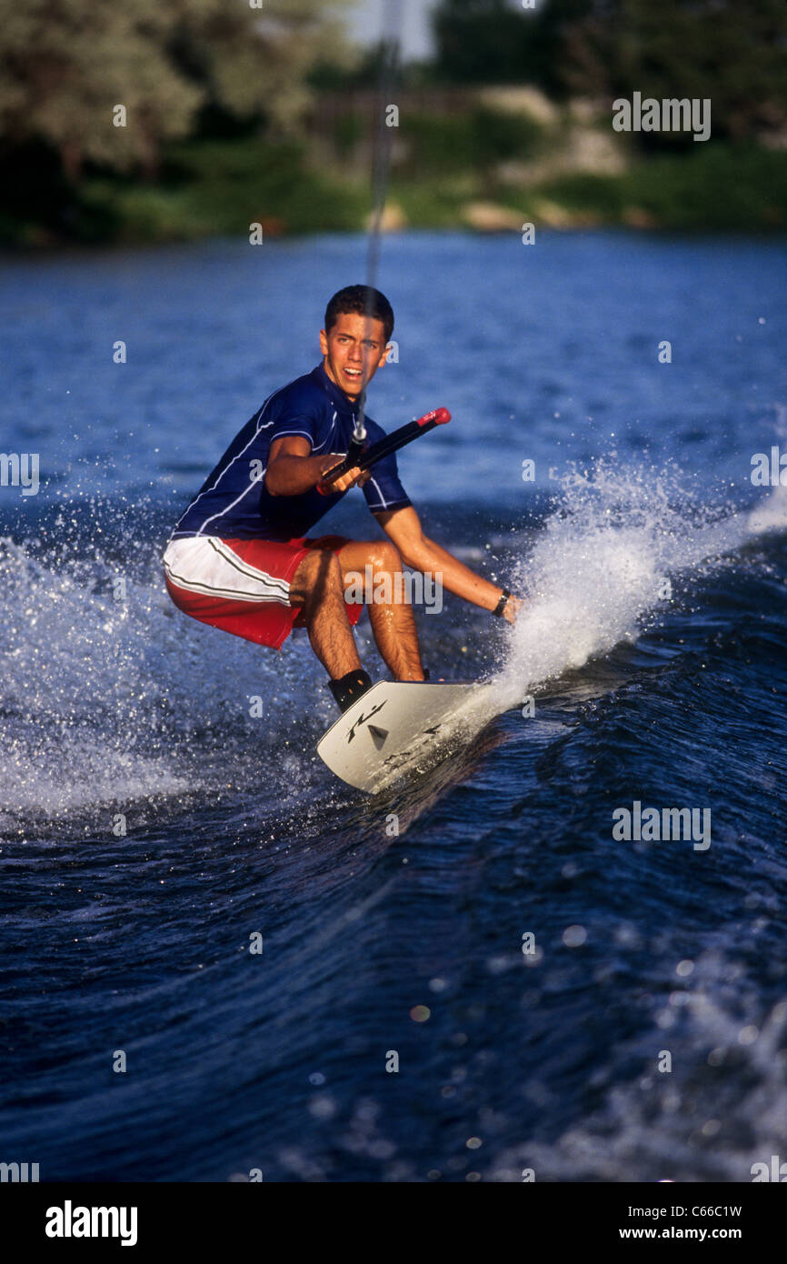 Young male water skier in action Stock Photo - Alamy