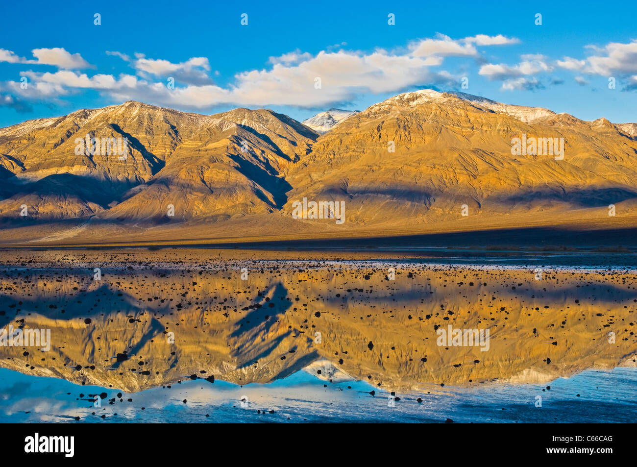 Reflections of the Panamint mountains at sunset. Panamint Valley lake ...