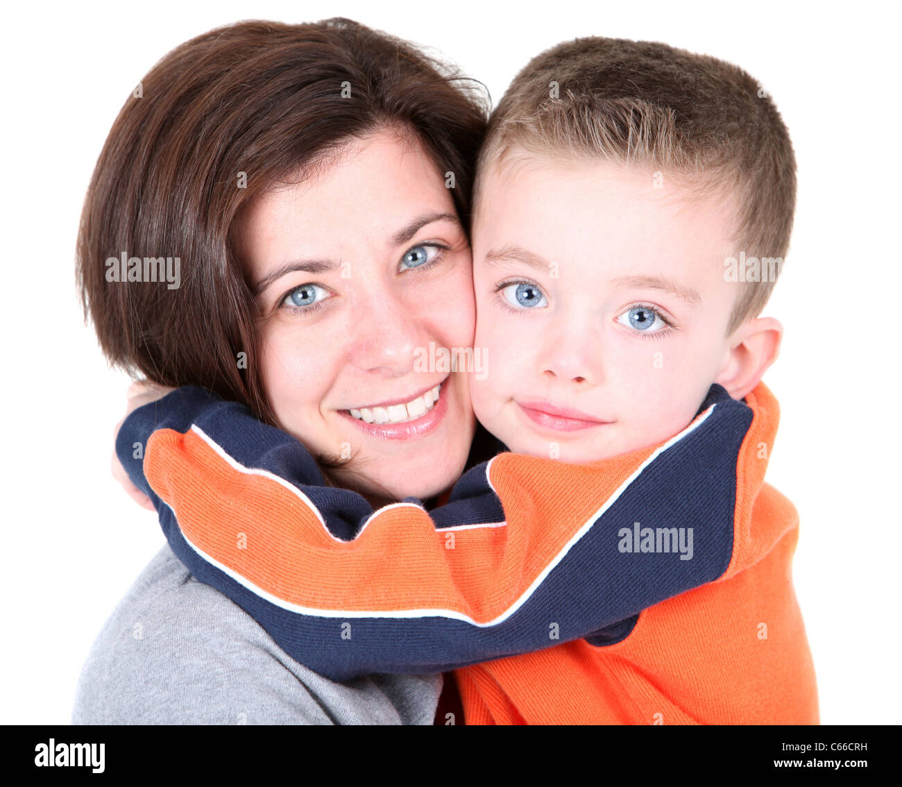 Pretty mom embracing cute son on white Stock Photo - Alamy