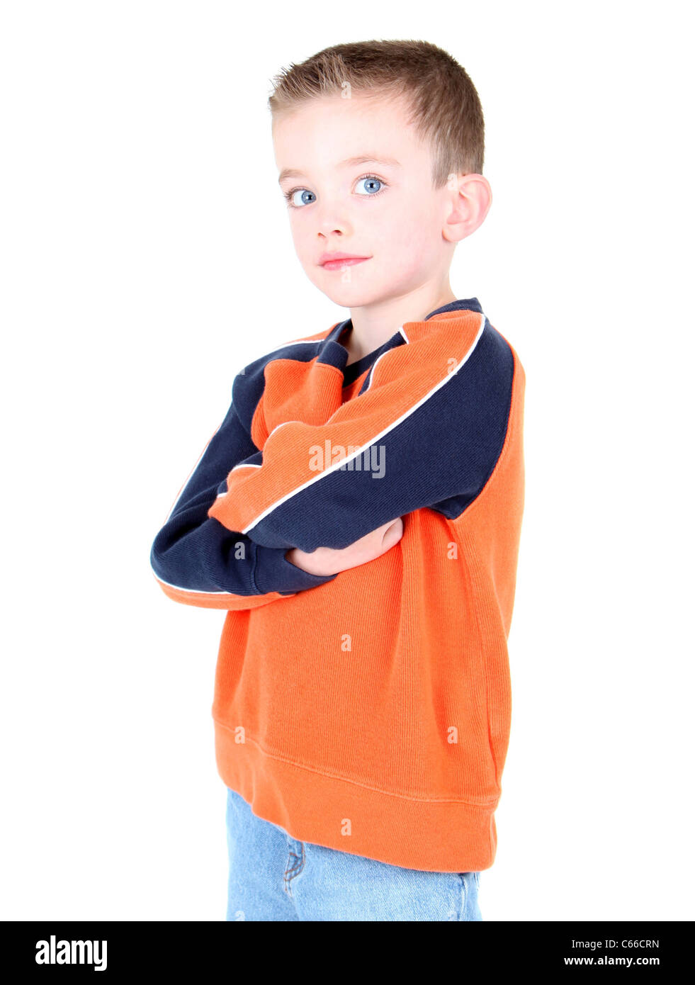 Cute boy with arms folded isolated on white Stock Photo - Alamy