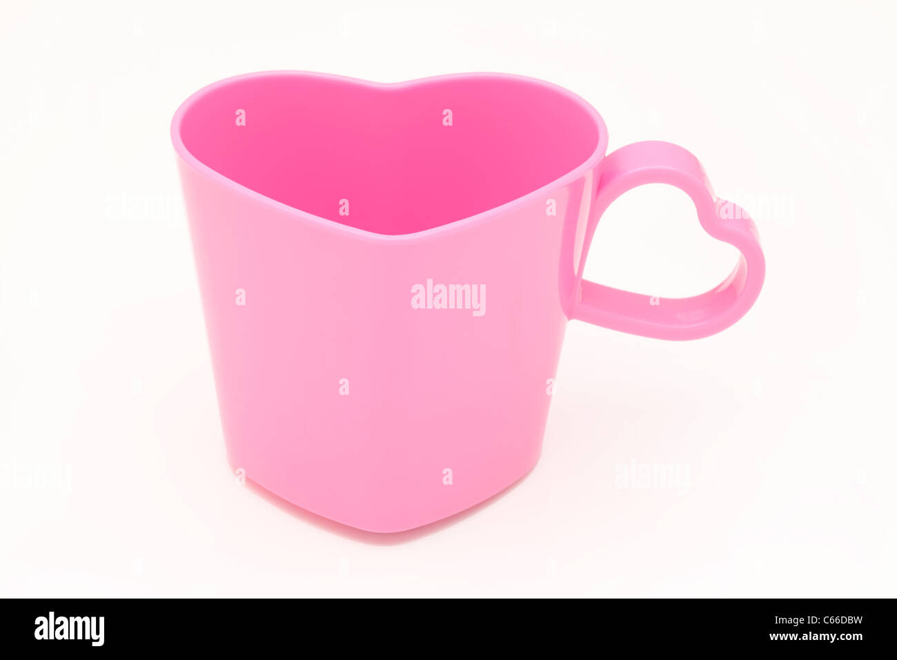 Mug cup of heart-shape isolated on white background Stock Photo - Alamy