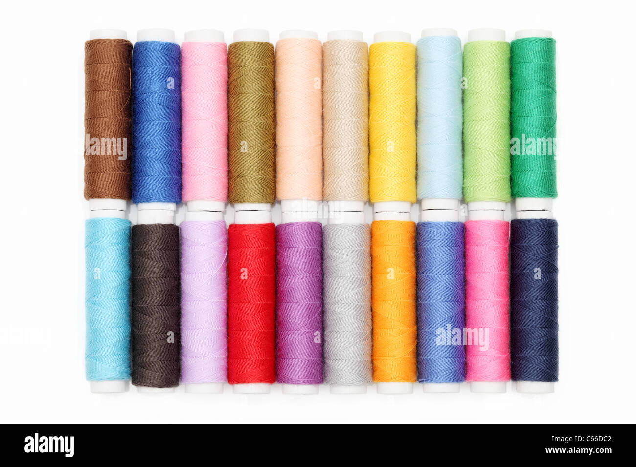 Spool of threads isolated on white background Stock Photo - Alamy