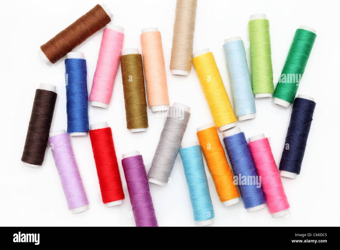 Spool of threads isolated on white background Stock Photo - Alamy