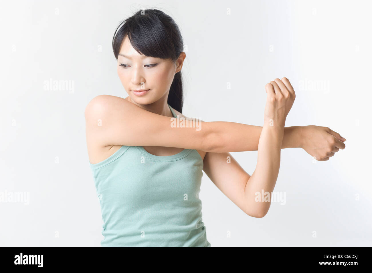 Woman Stretching Arms Stock Photo - Alamy