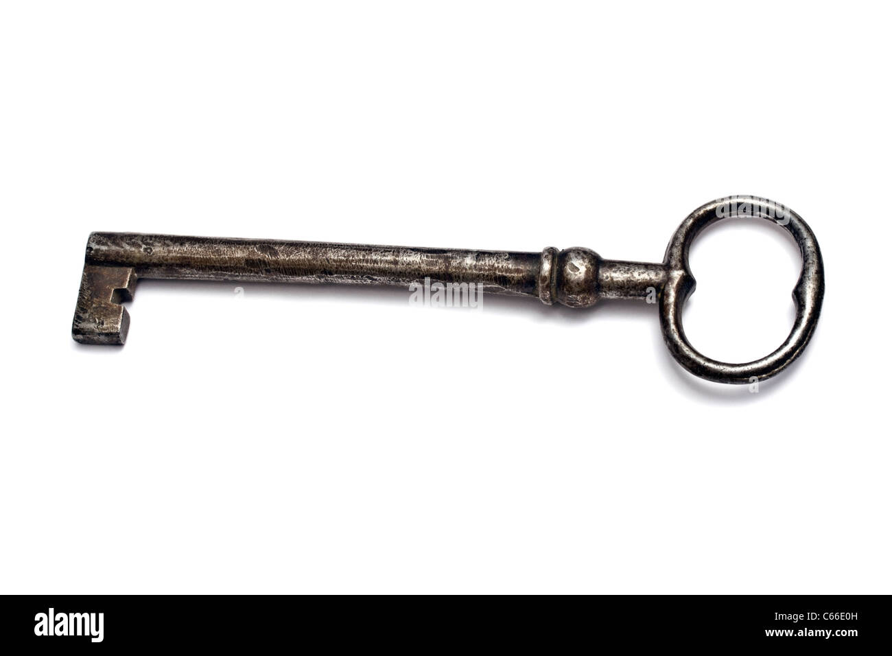 Old key isolated on white background Stock Photo - Alamy