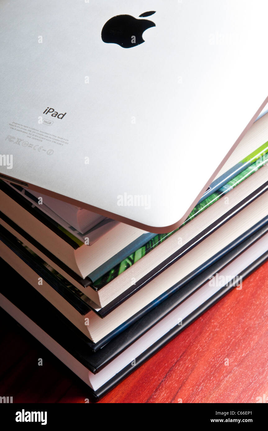 iPad and books Stock Photo - Alamy