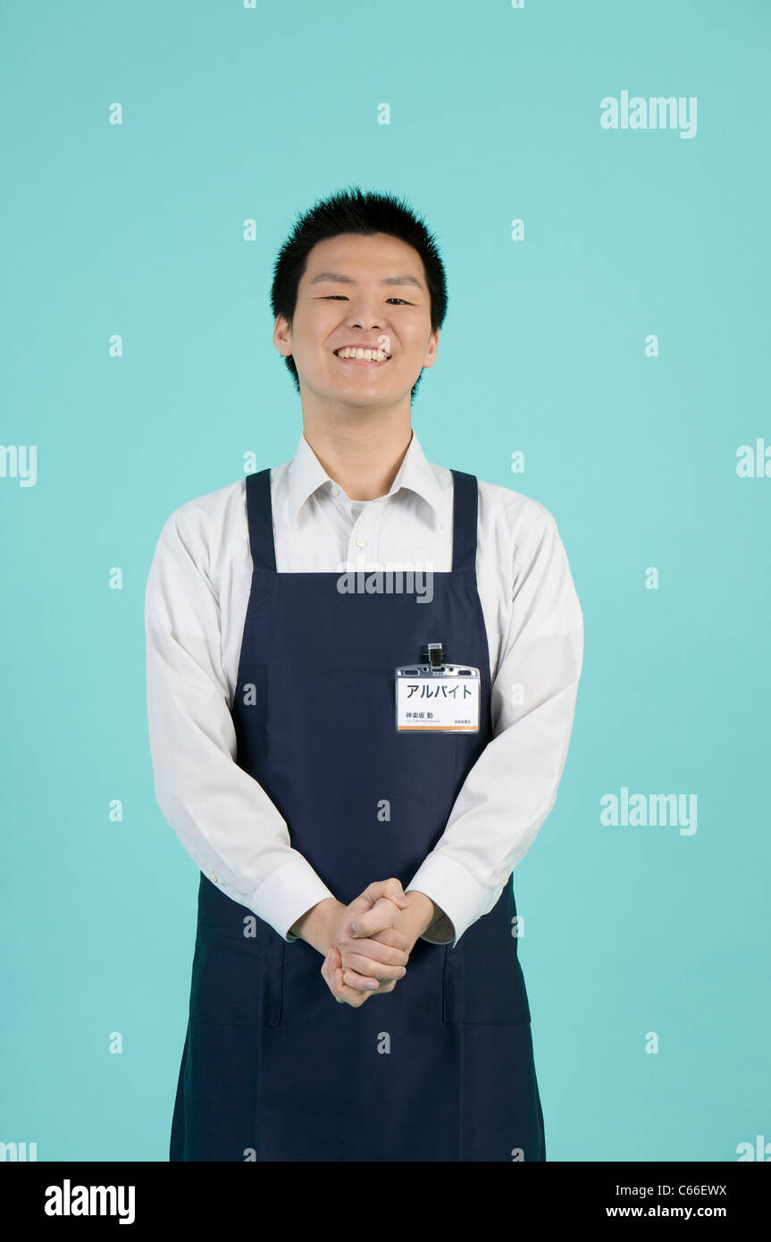 Portrait of Clerk with Apron Stock Photo - Alamy