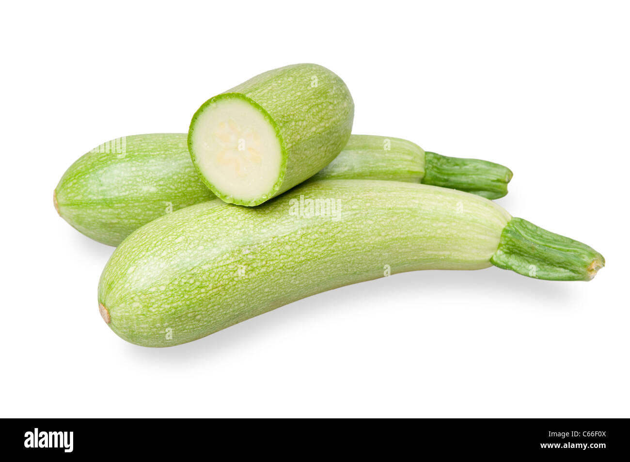 Green zucchini vegetable isolated on white background Stock Photo - Alamy