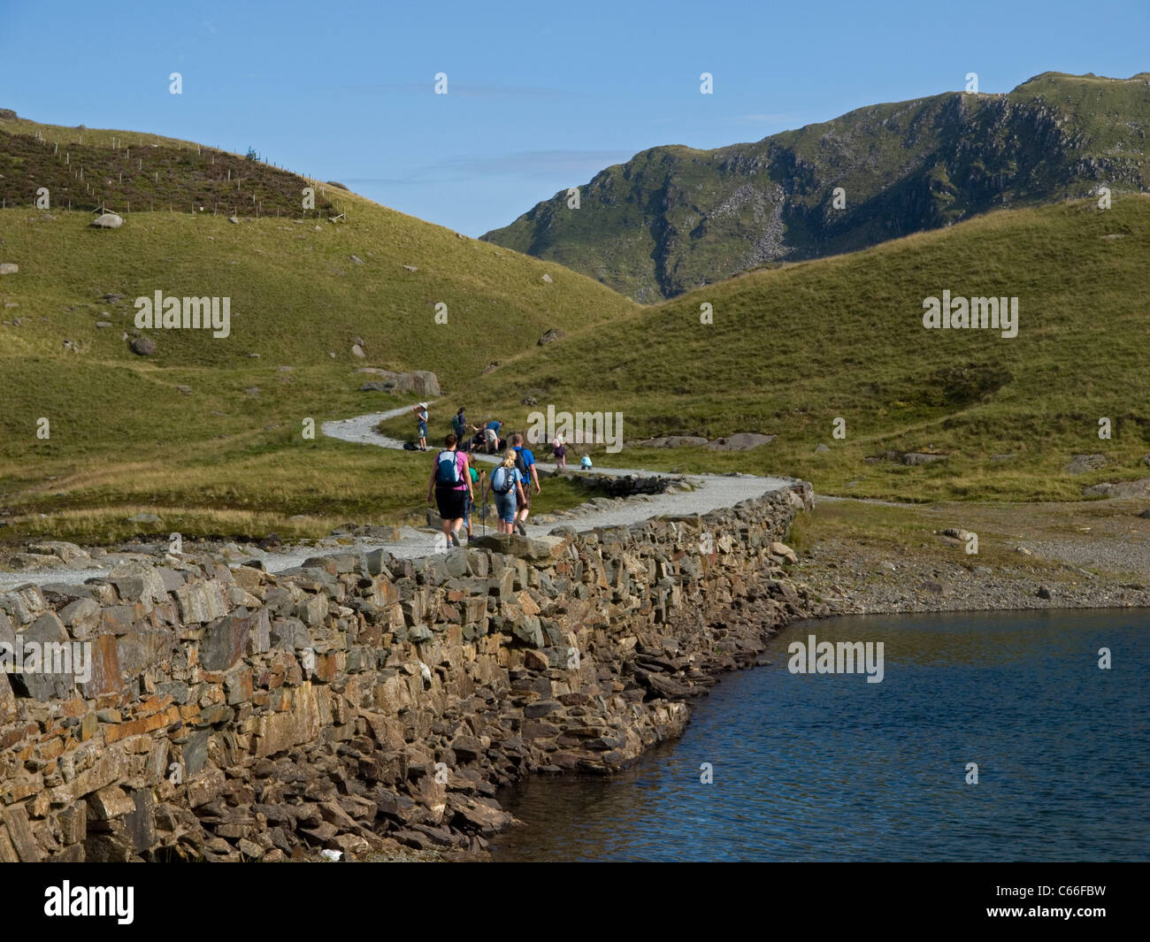 walkers on the miners track causeway Snowdon Wales Stock Photo - Alamy