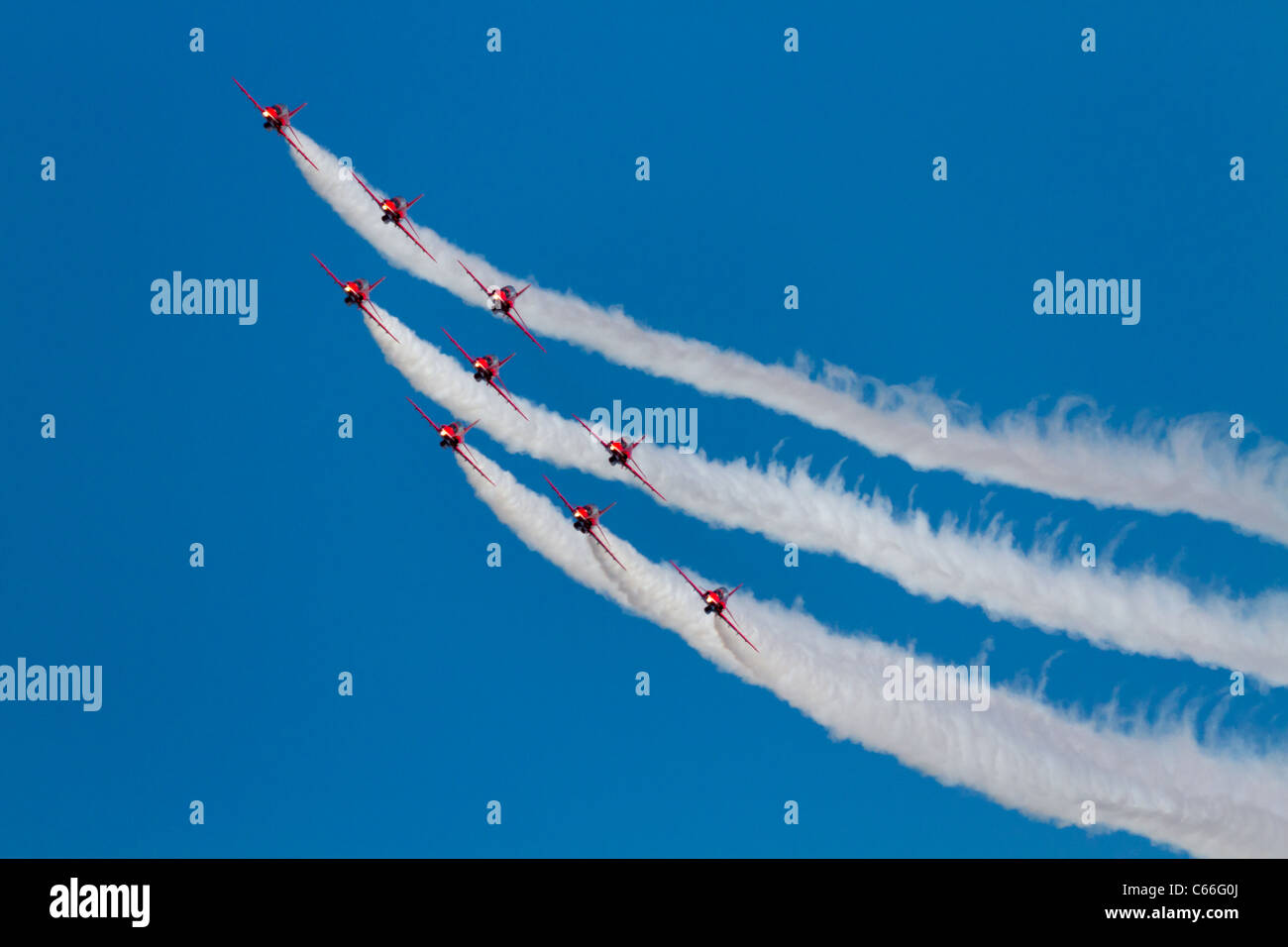 The Red Arrows performing a manoeuvre Stock Photo - Alamy