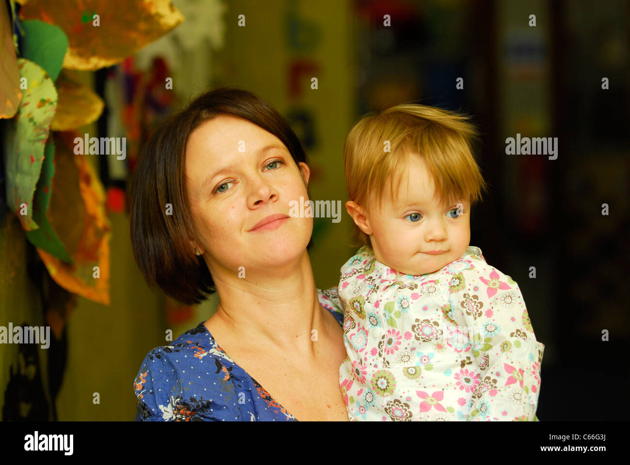 Mother with her baby at a creche, Northumberland, UK Stock Photo - Alamy