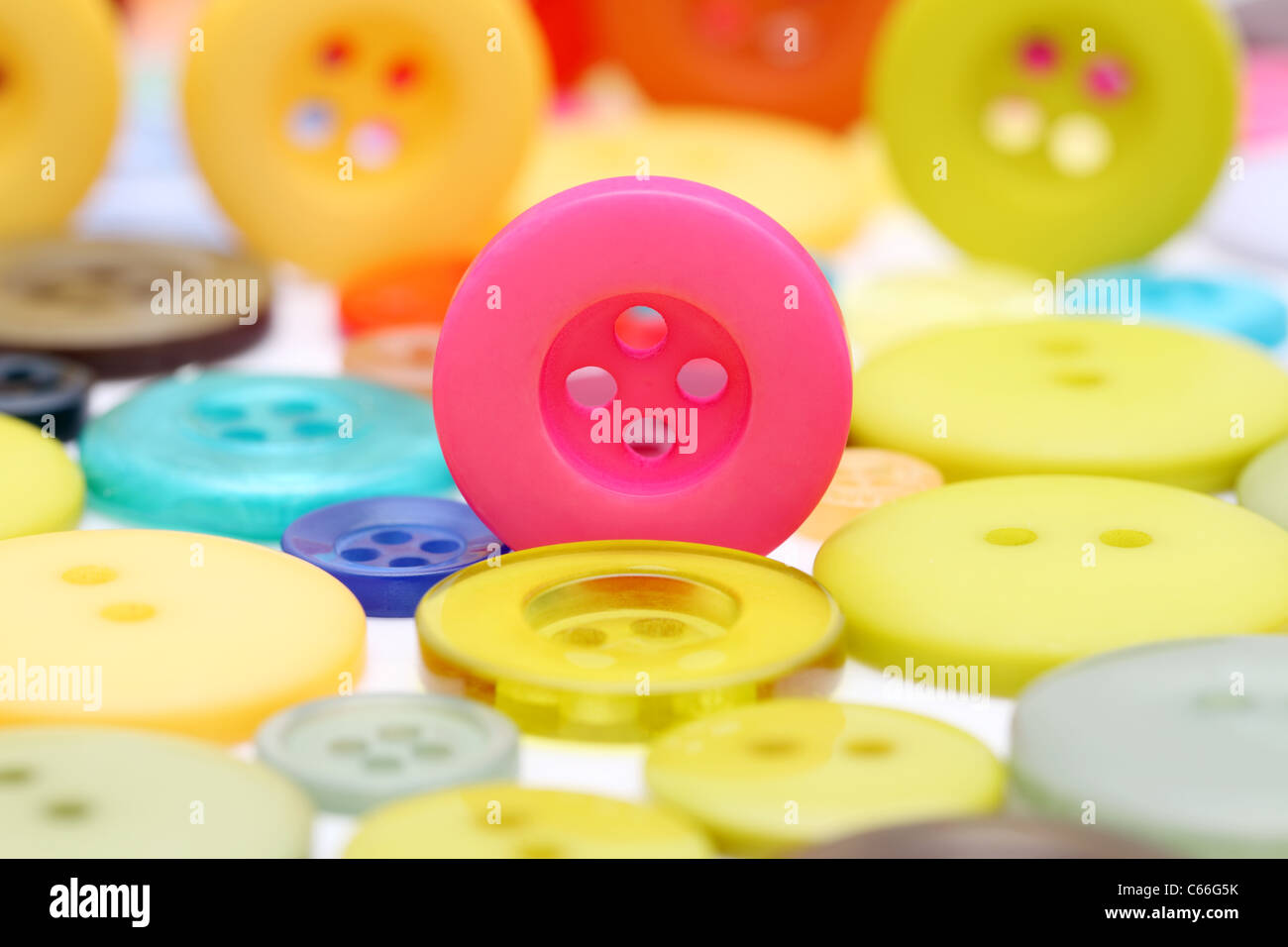 Colorful buttons on white Stock Photo - Alamy