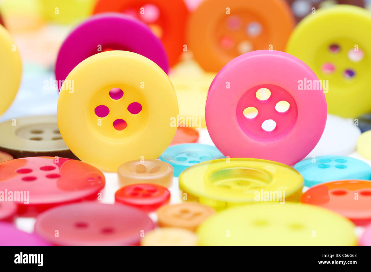 Colorful buttons on white Stock Photo - Alamy
