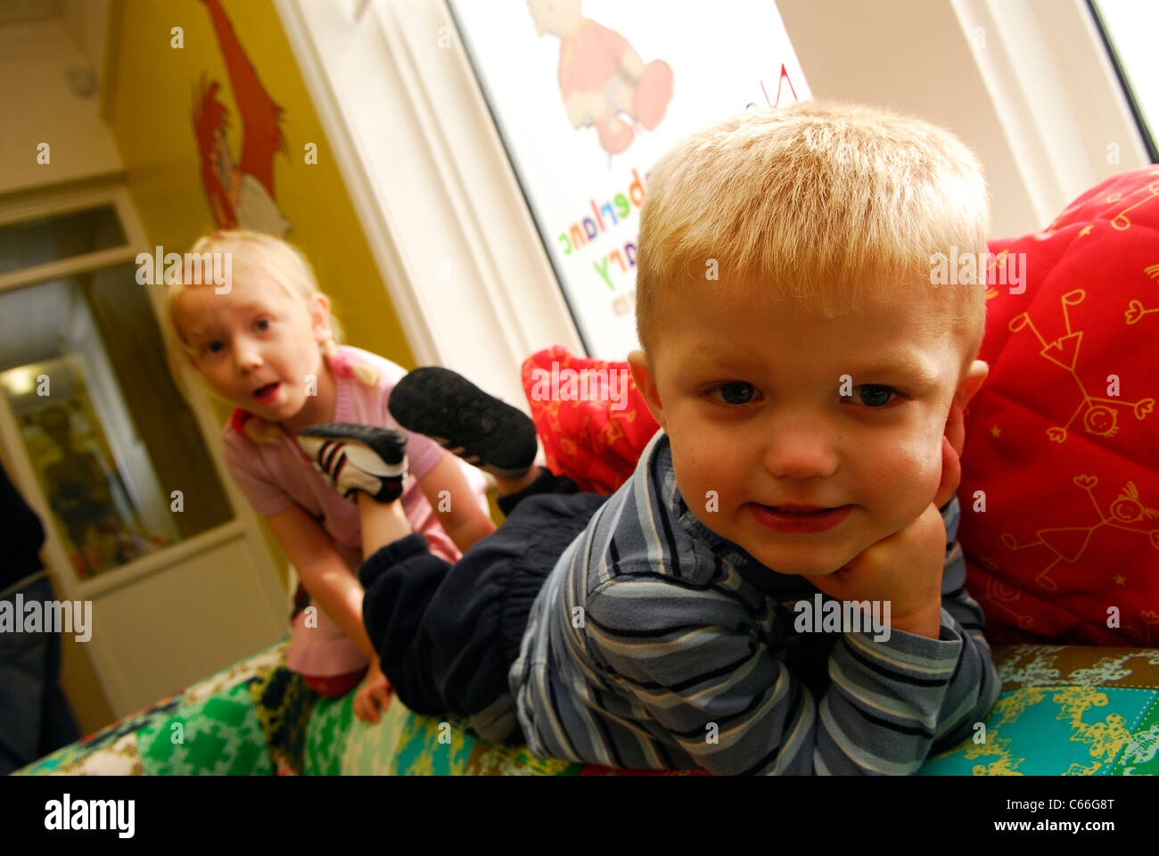 Children playing at creche hi-res stock photography and images - Alamy