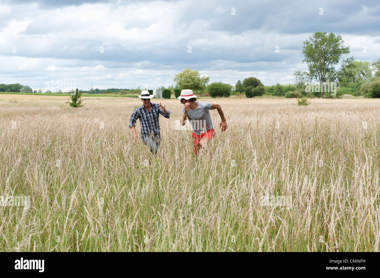 The men are in the field hi-res stock photography and images - Alamy