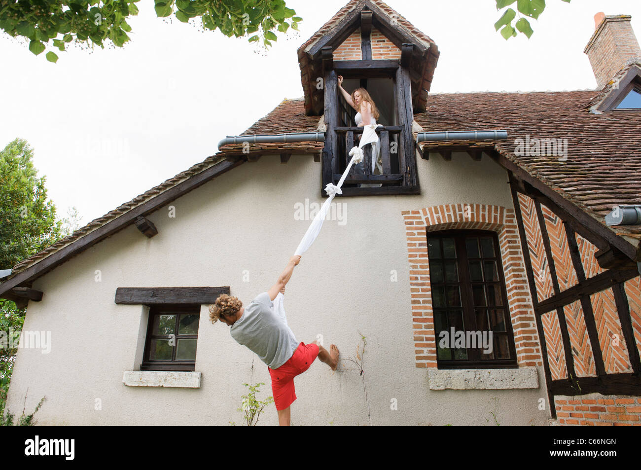 Man sneaking into room with woman hi-res stock photography and images ...