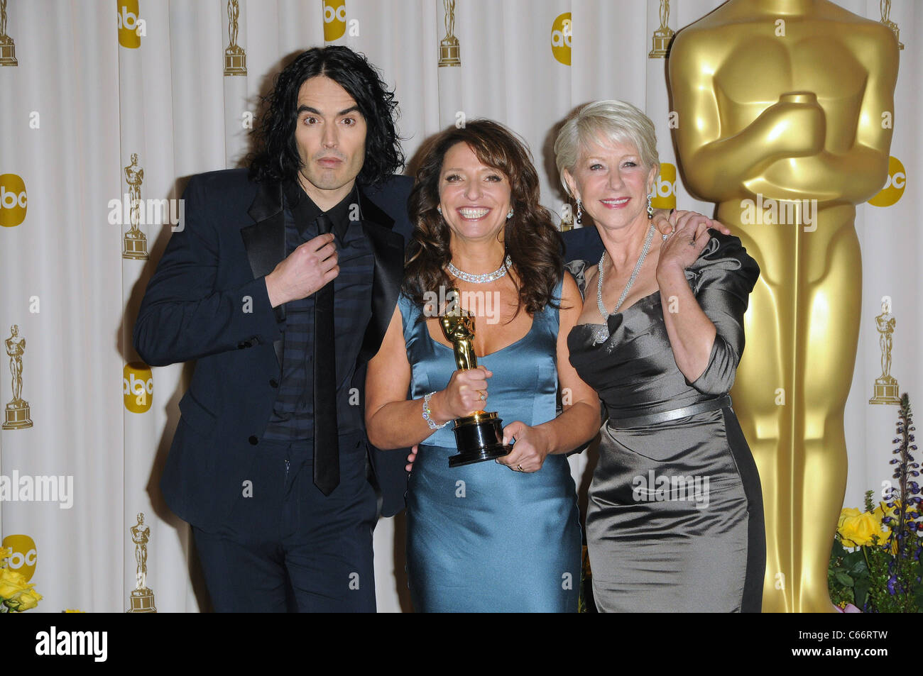Russell Brand, Susanne Bier, and Helen Mirren in the press room for The ...