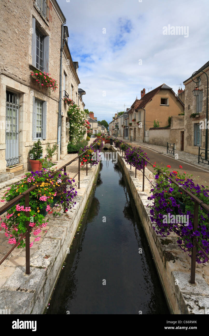 Flower lined Rue du Pont in the medieval town of Beaugency in the Loire ...