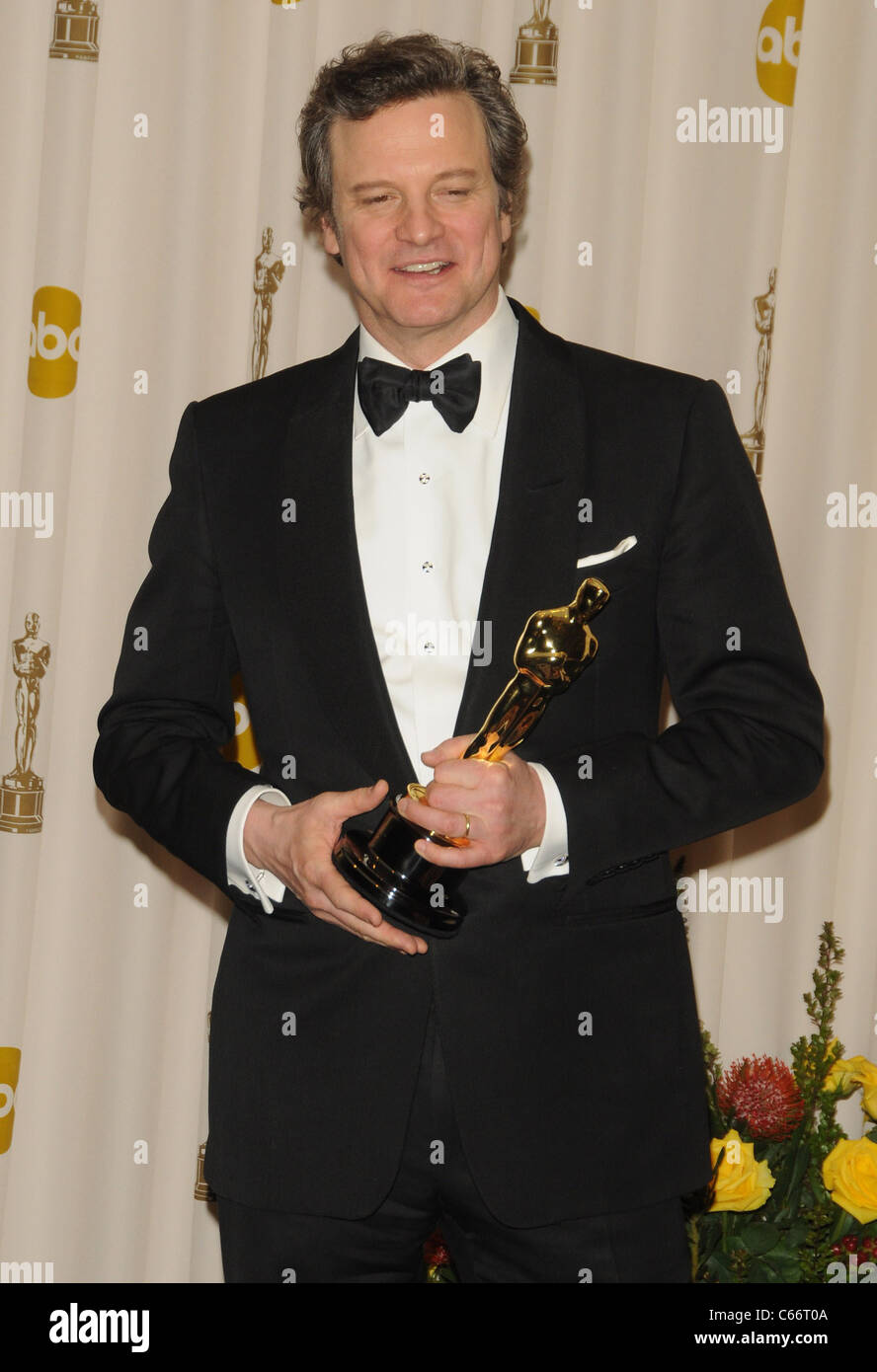 Colin firth with his best actor award hi-res stock photography and ...