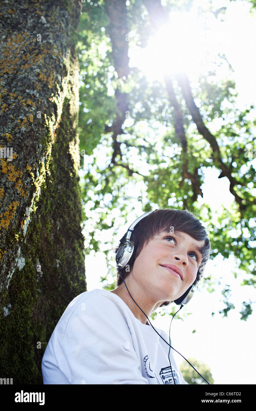 Boy Sitting Leaning Tree High Resolution Stock Photography and Images ...