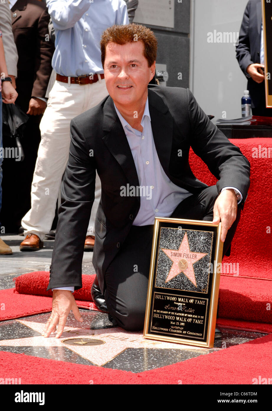 Simon Fuller at the induction ceremony for Star on the Hollywood Walk ...