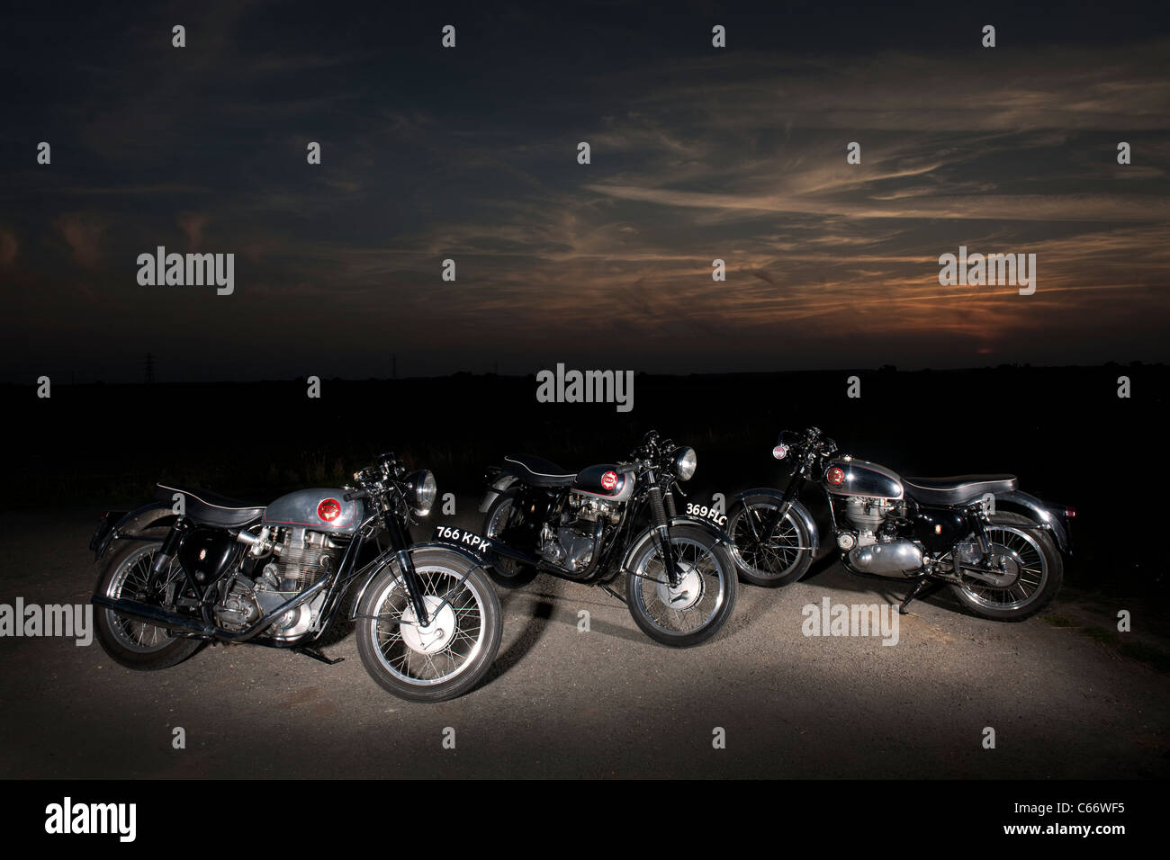 BSA line-up - 3 classic BSA Motorcycles at dusk Stock Photo - Alamy