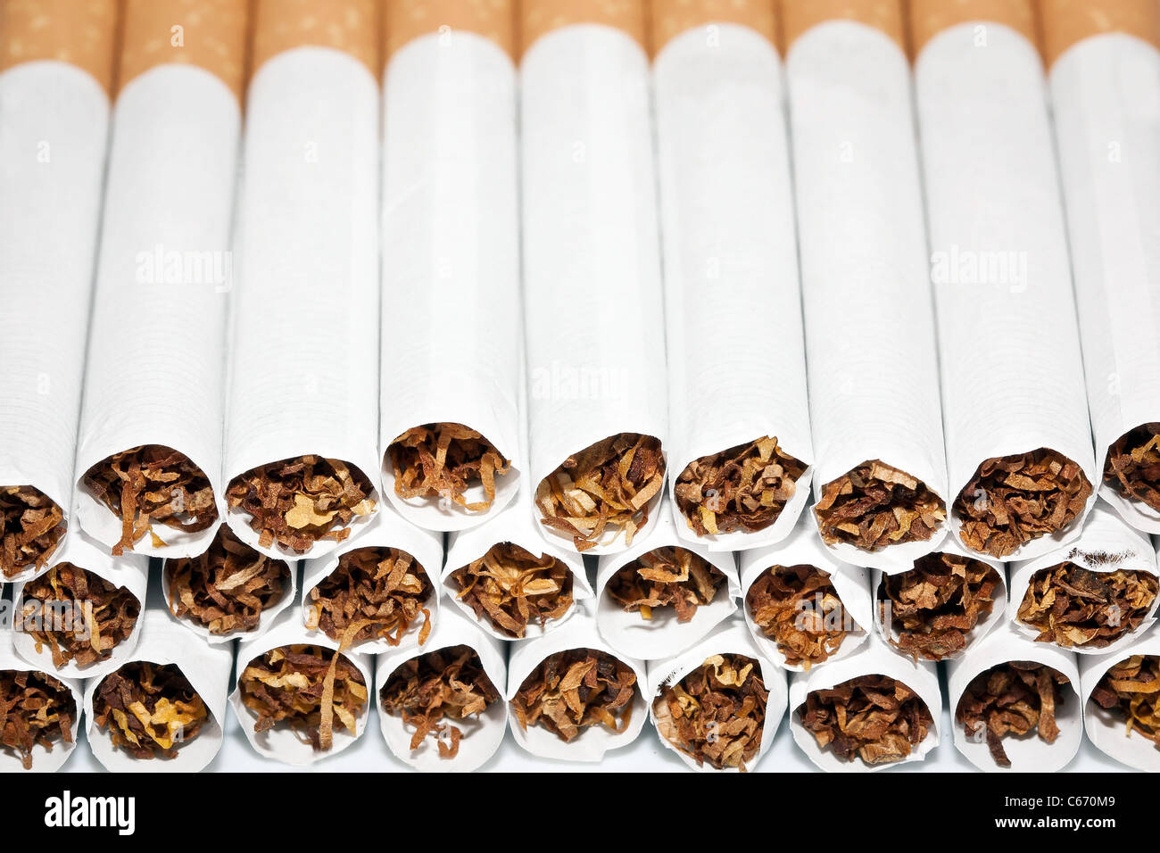 Close up of a smoking cigarettes in a stack Stock Photo - Alamy