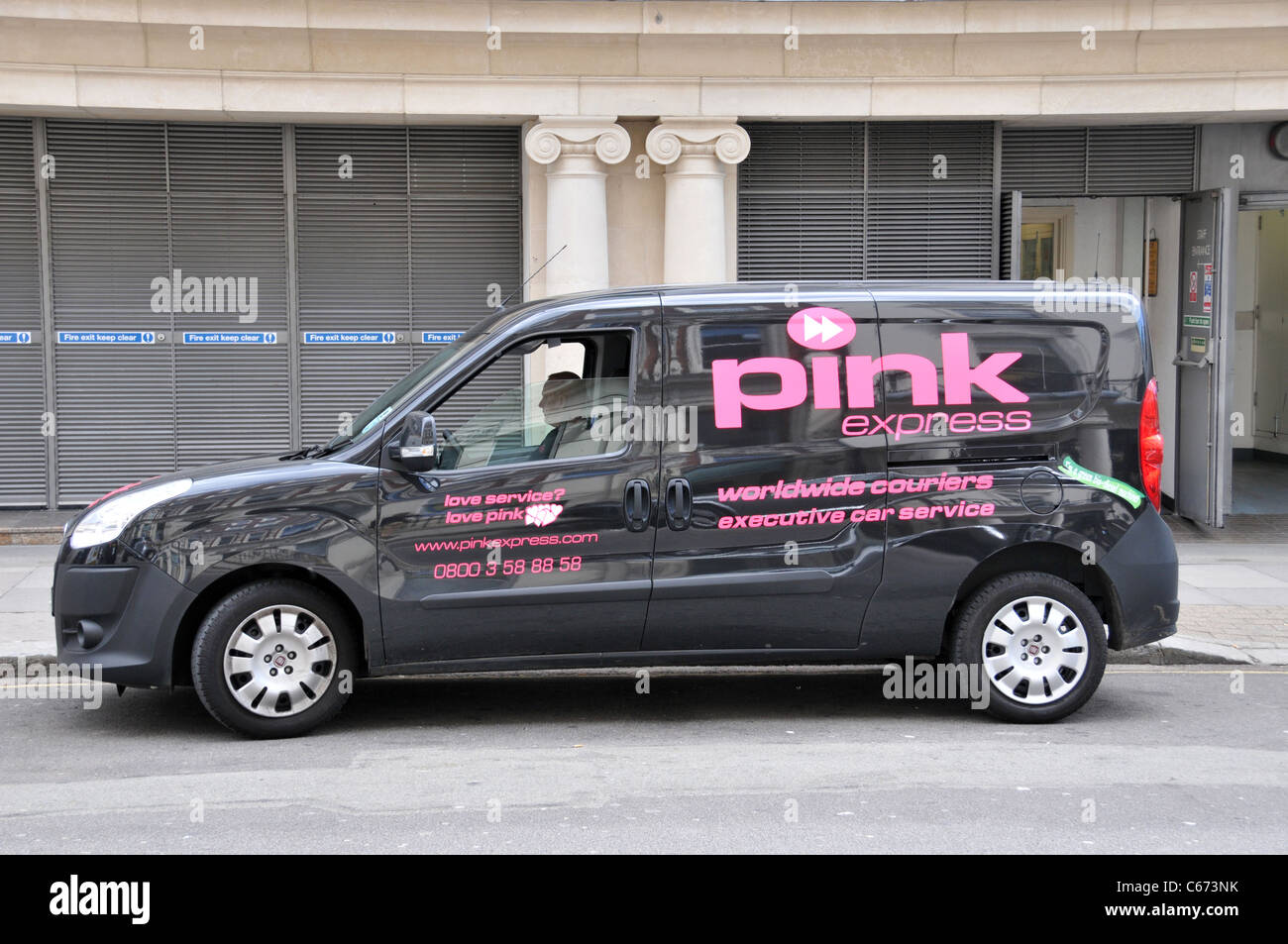 Pink Express delivery van Stock Photo - Alamy
