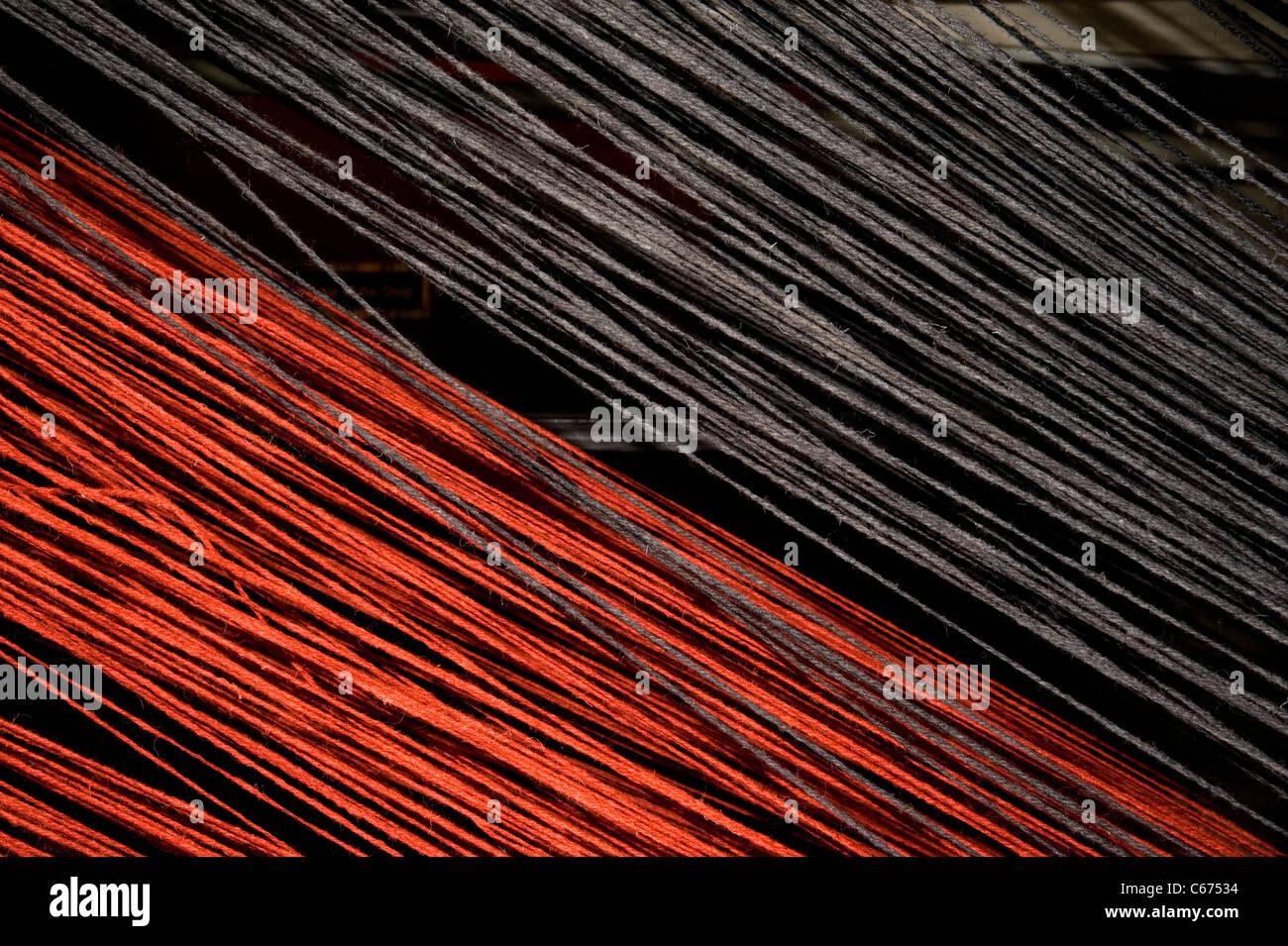 colored wool threads on weaving loom Stock Photo - Alamy