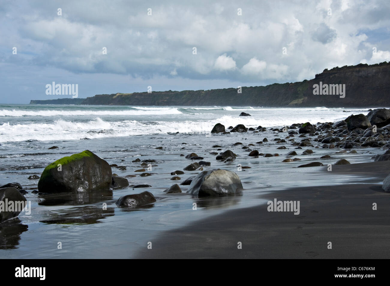 The Black Volcanic Beach and Rocky Shore on the South Taranaki Bight by ...