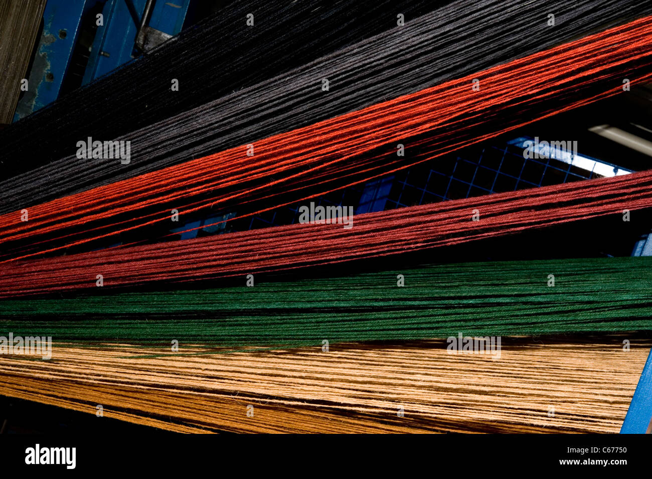 colored wool threads on weaving loom Stock Photo - Alamy