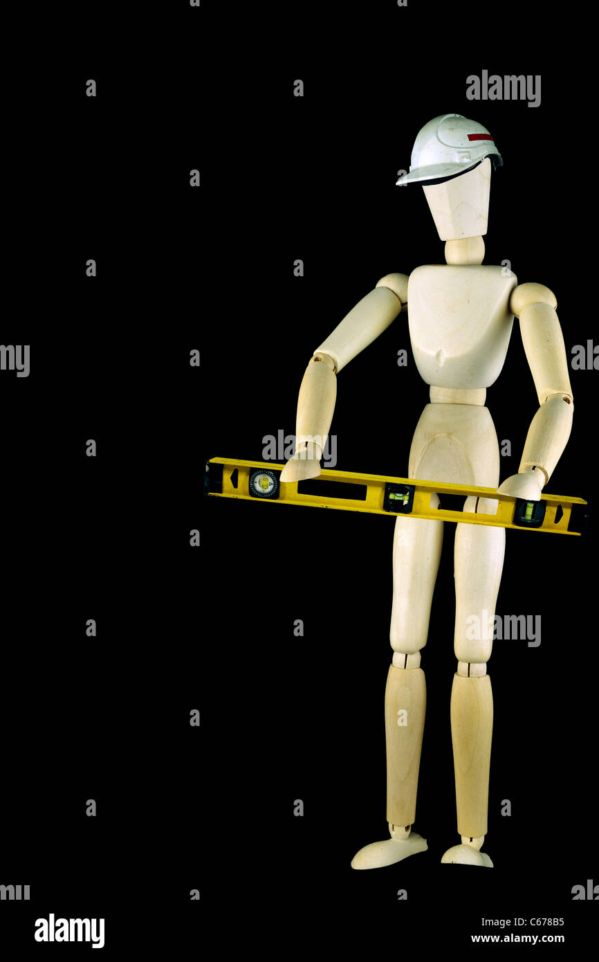 Mannequin as a construction worker wearing hard hat and holding tools ...