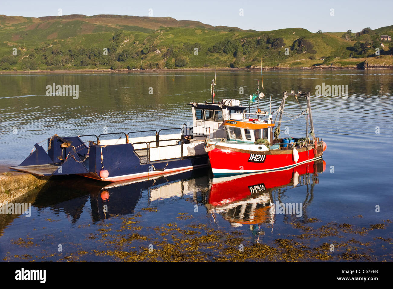 FISHING BOAT AND FERRY Stock Photo - Alamy