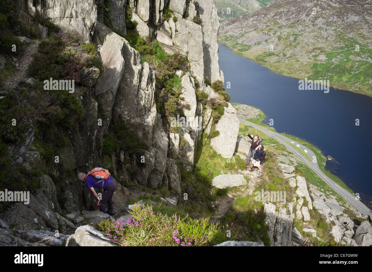 North Wales, UK. Walkers near start of Tryfan north ridge scramble ...