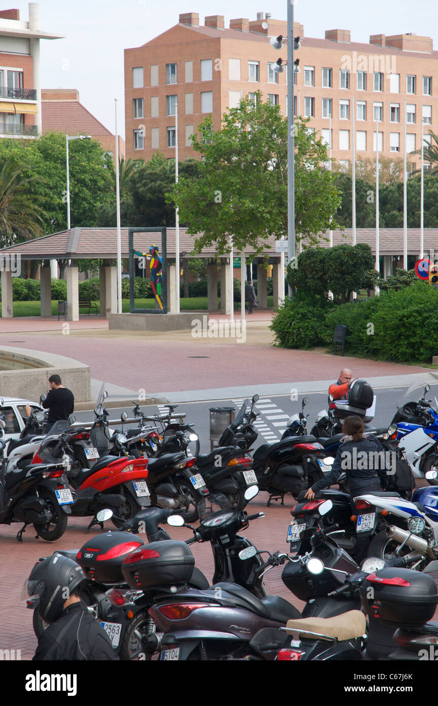 Parked motorcycles and mopeds in Barcelona city Stock Photo - Alamy