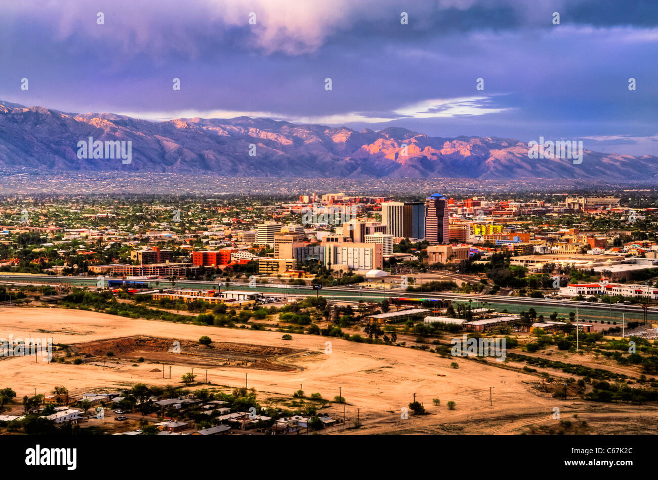 The Tucson skyline is dominated by mountains in every direction. Close ...