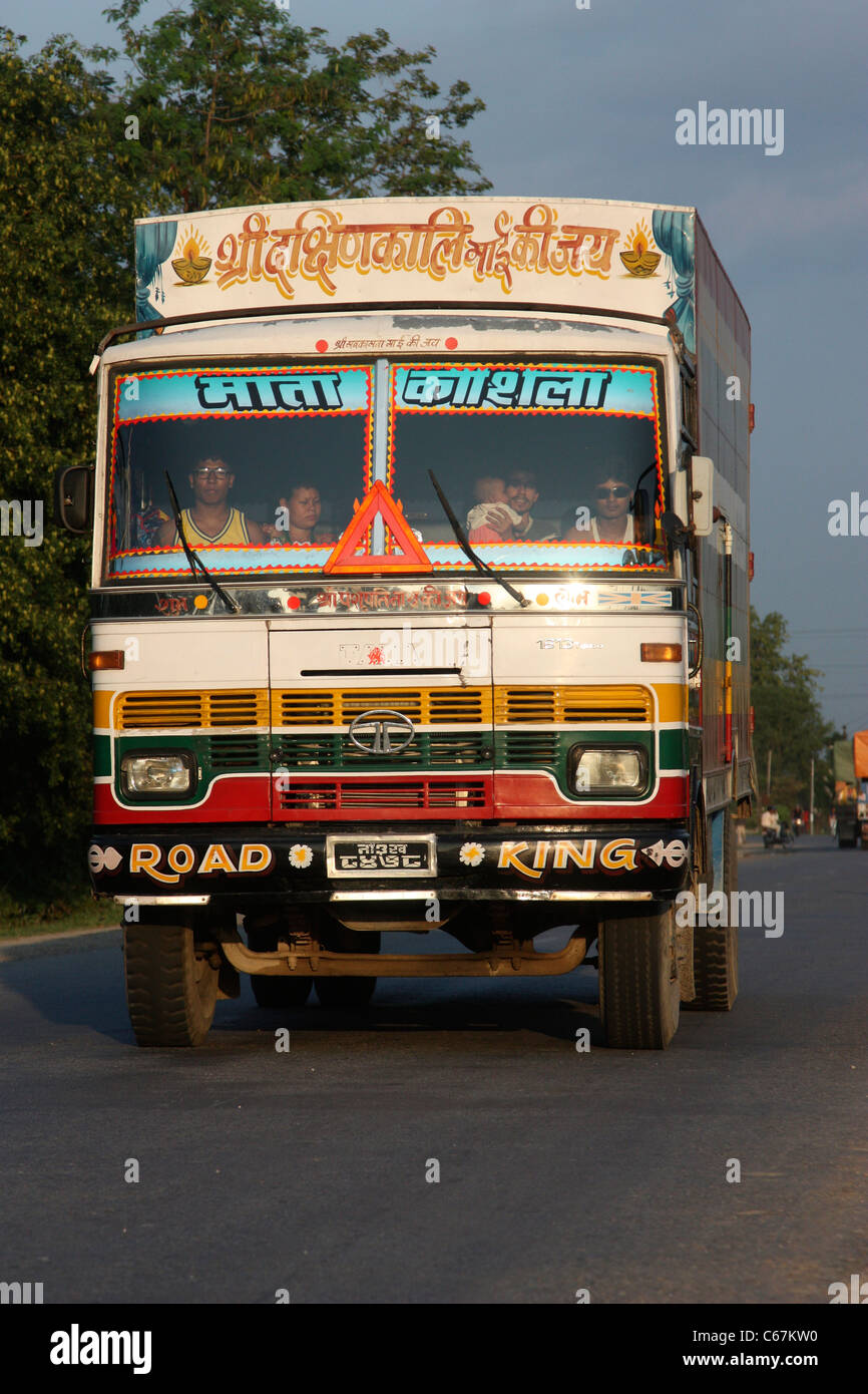 Decorated Nepali Tata 1613 truck speeds on a highway at sunset Stock ...