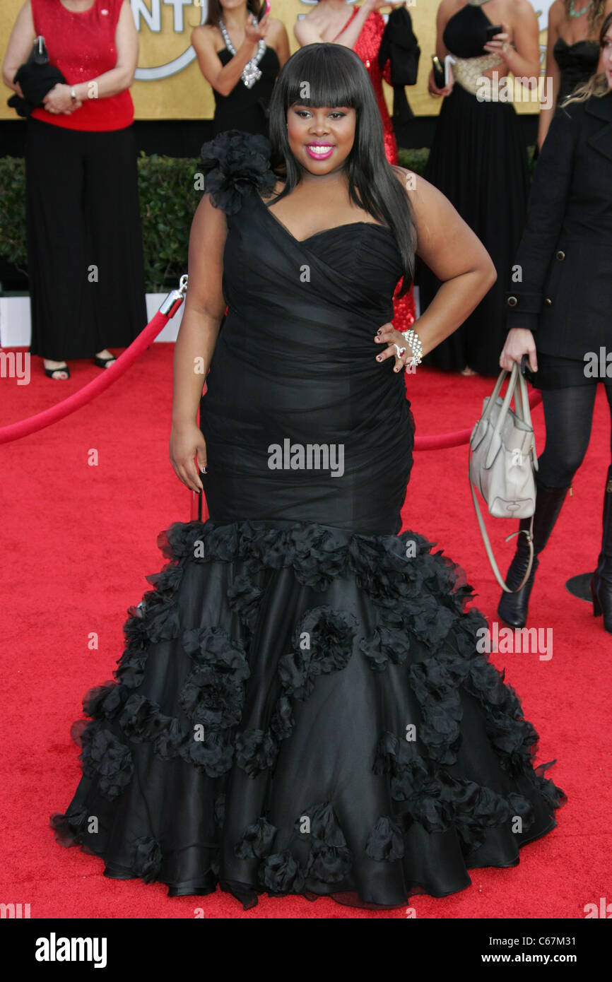 Amber Riley (wearing a Anne Barge dress and Chopard jewelry) at ...