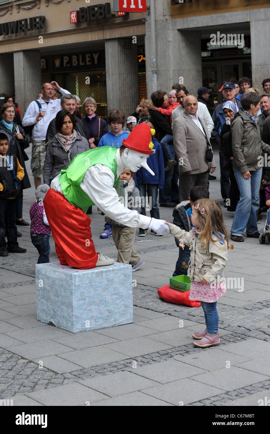 Mime artist entertaining crowds in Munich Bavaria Germany Munchen ...